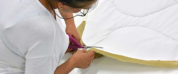 The steps of making a pure new wool duvet - Biodom (en)